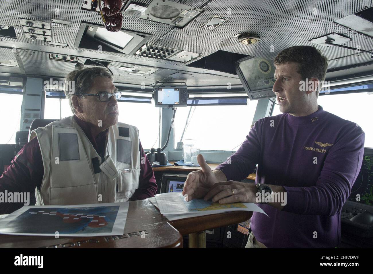 Secretary of Energy Rick Perry, left, discusses Hurricane Irma with ...