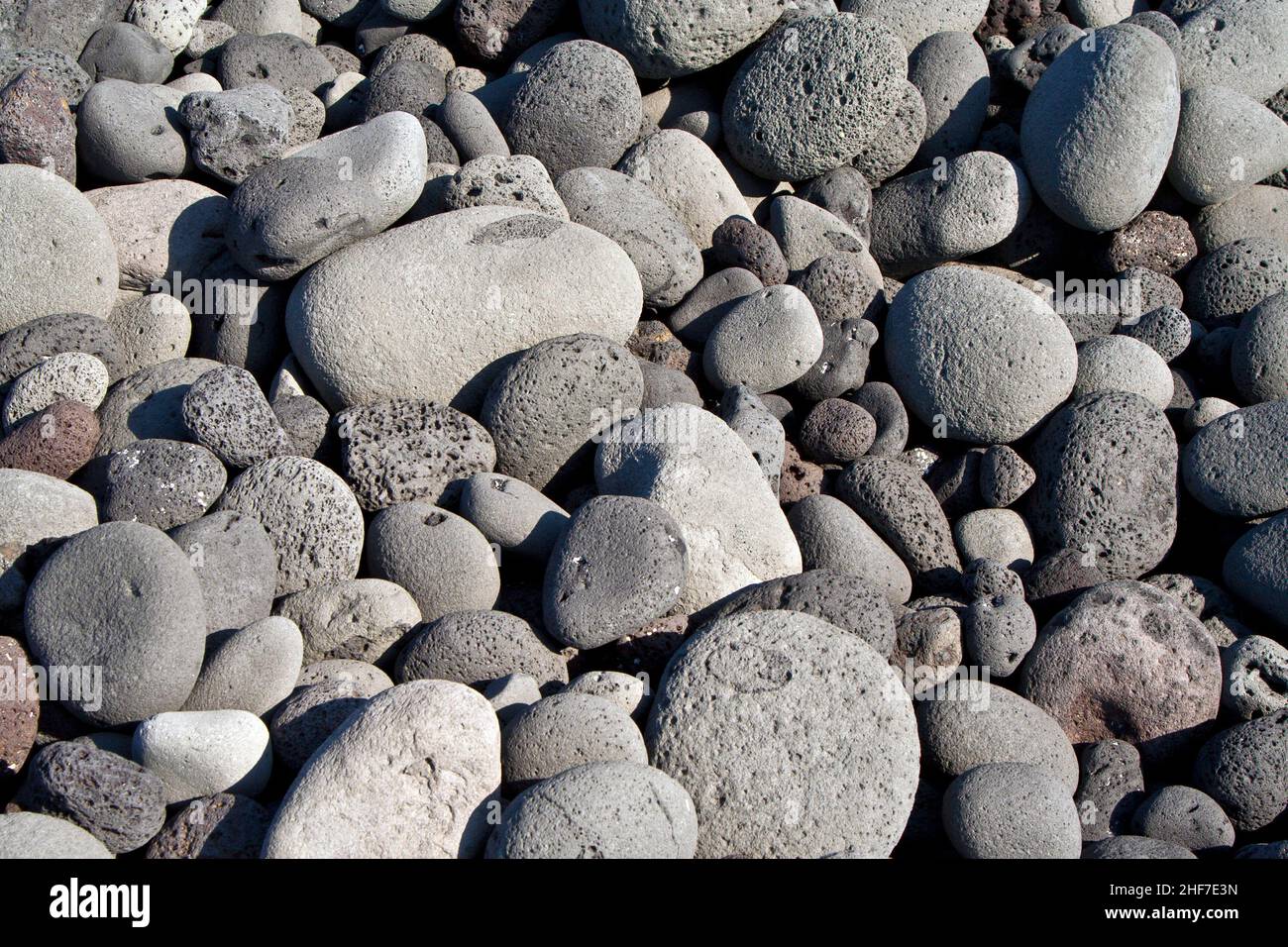 volcanic stone formation at the beach formed by seawater Stock Photo ...