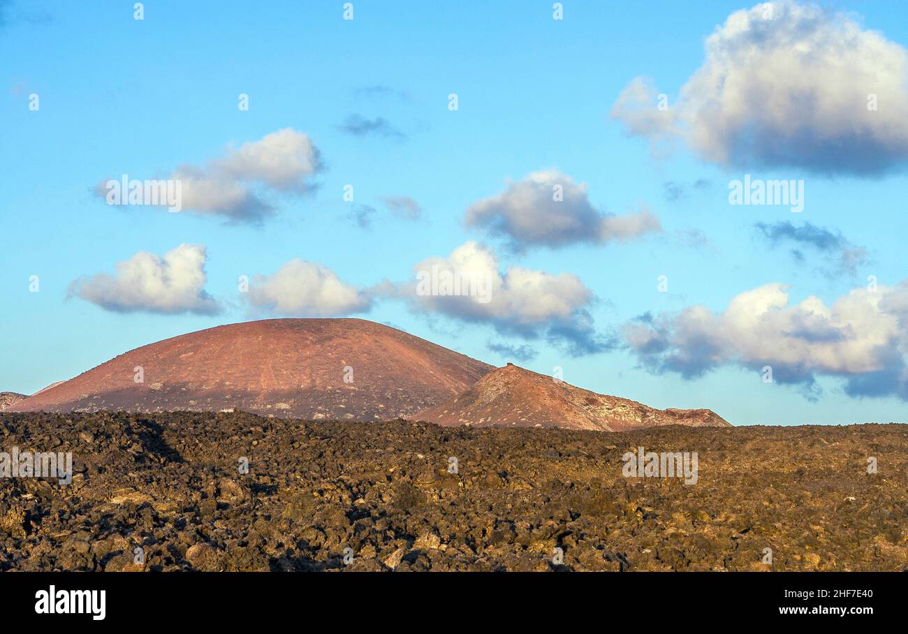 vulcanic landscape under the extincted vulcano in Timanfaya National ...
