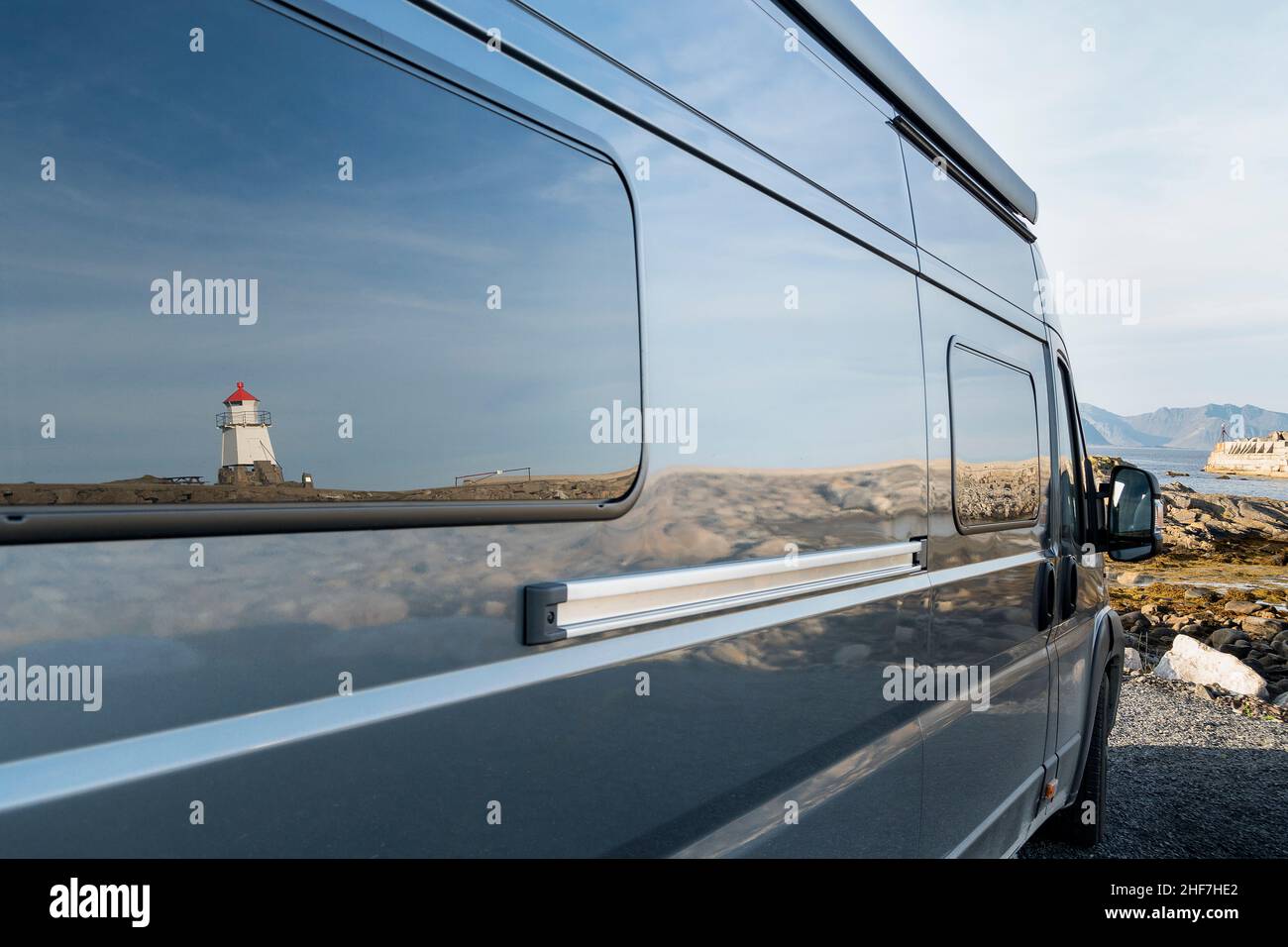 Norway, Lofoten, Austvågøya, Laukvik, lighthouse, reflection in camper ...
