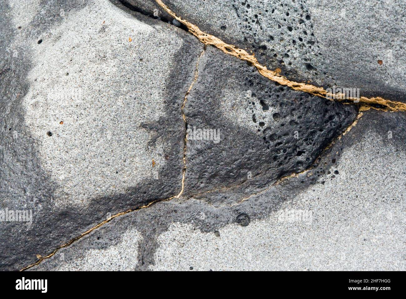 beautiful stone structure at the coast line with channel of other stone ...