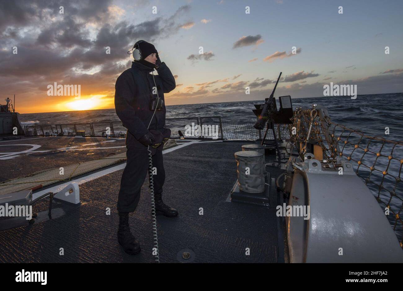 Seaman standing aft lookout watch aboard USS Carney (DDG-64) in the ...