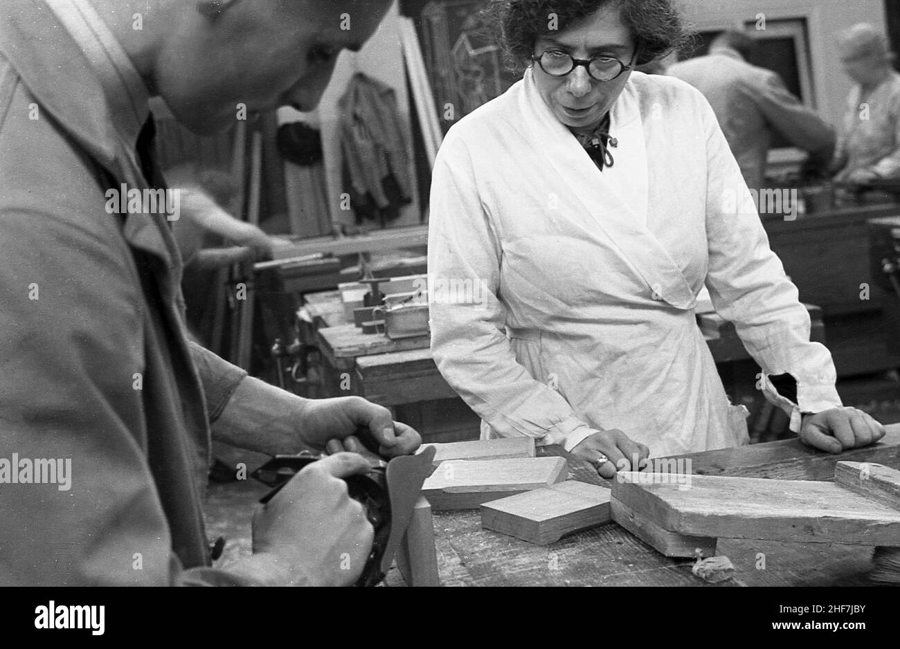 1940s, historical, ladies at a wood-working class, with male instructor ...