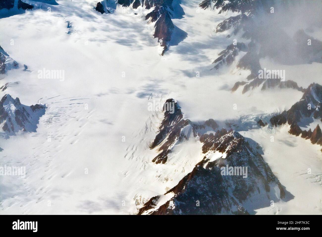 Aerial view of the antarctica with glaciers, mountain, snow and river ...