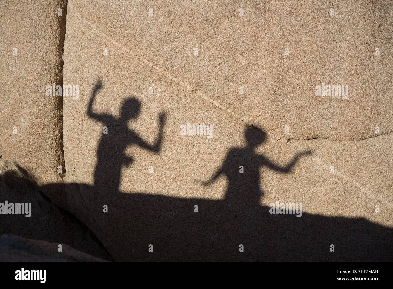 Shadow figures with hands hi-res stock photography and images - Alamy