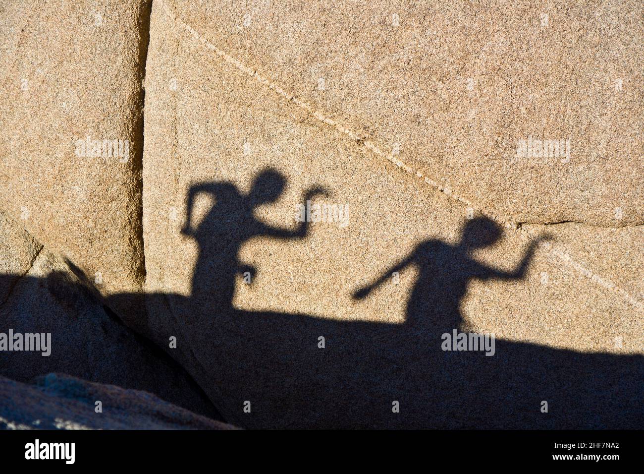 Two children playing on rocks hi-res stock photography and images - Alamy