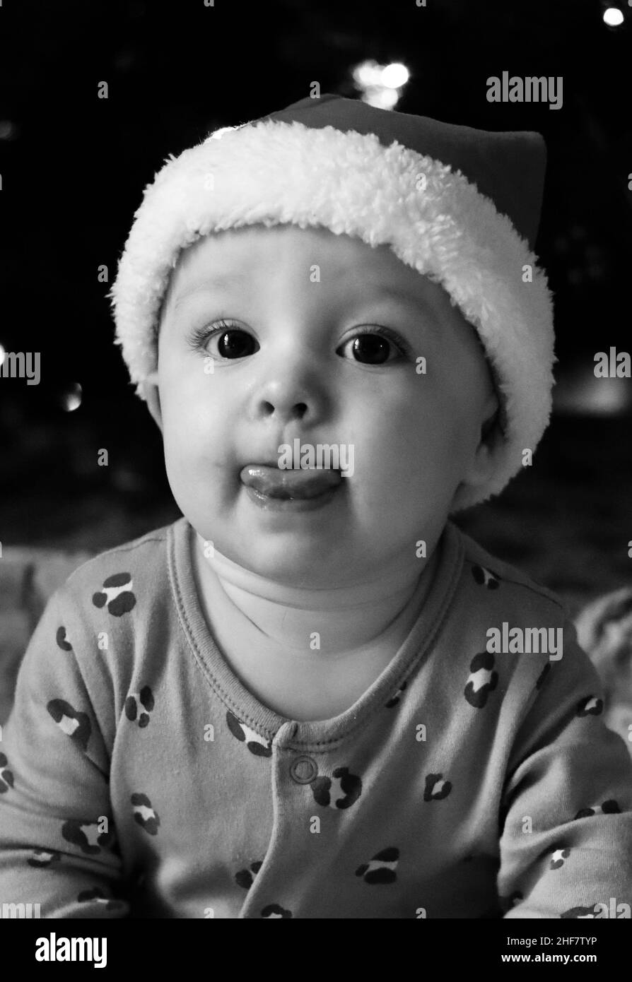 Baby wearing christmas hat Black and White Stock Photos & Images - Alamy