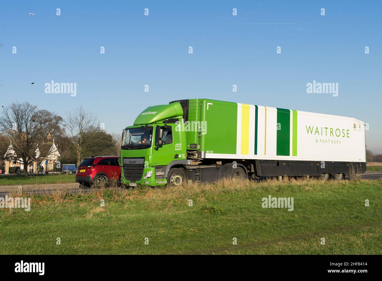 side view of Waitrose HGV delivery Lorry on London road England UK ...