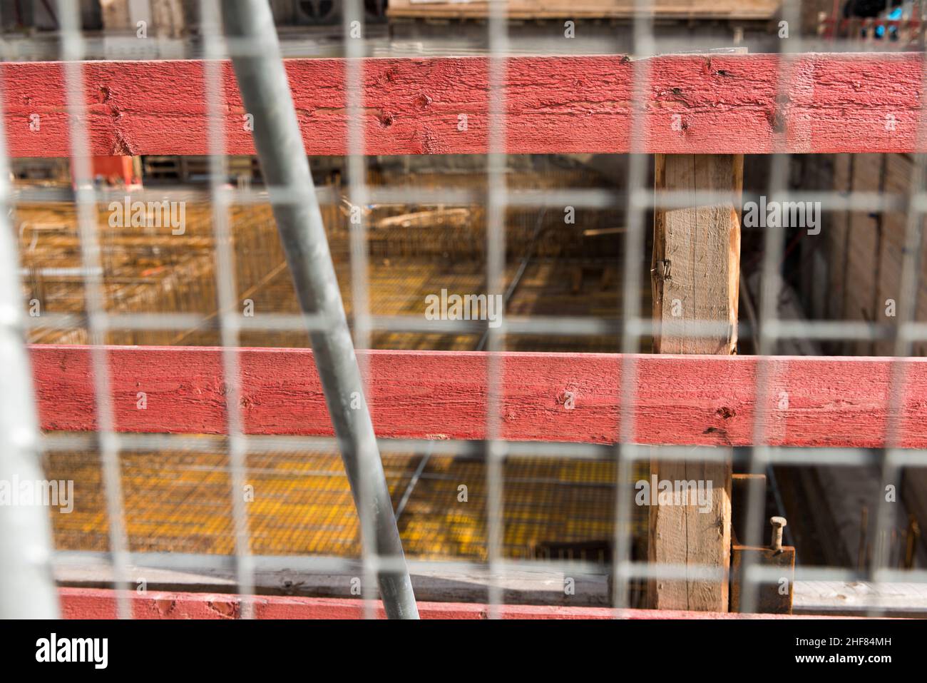 Construction site, scaffolding, site fence Stock Photo - Alamy