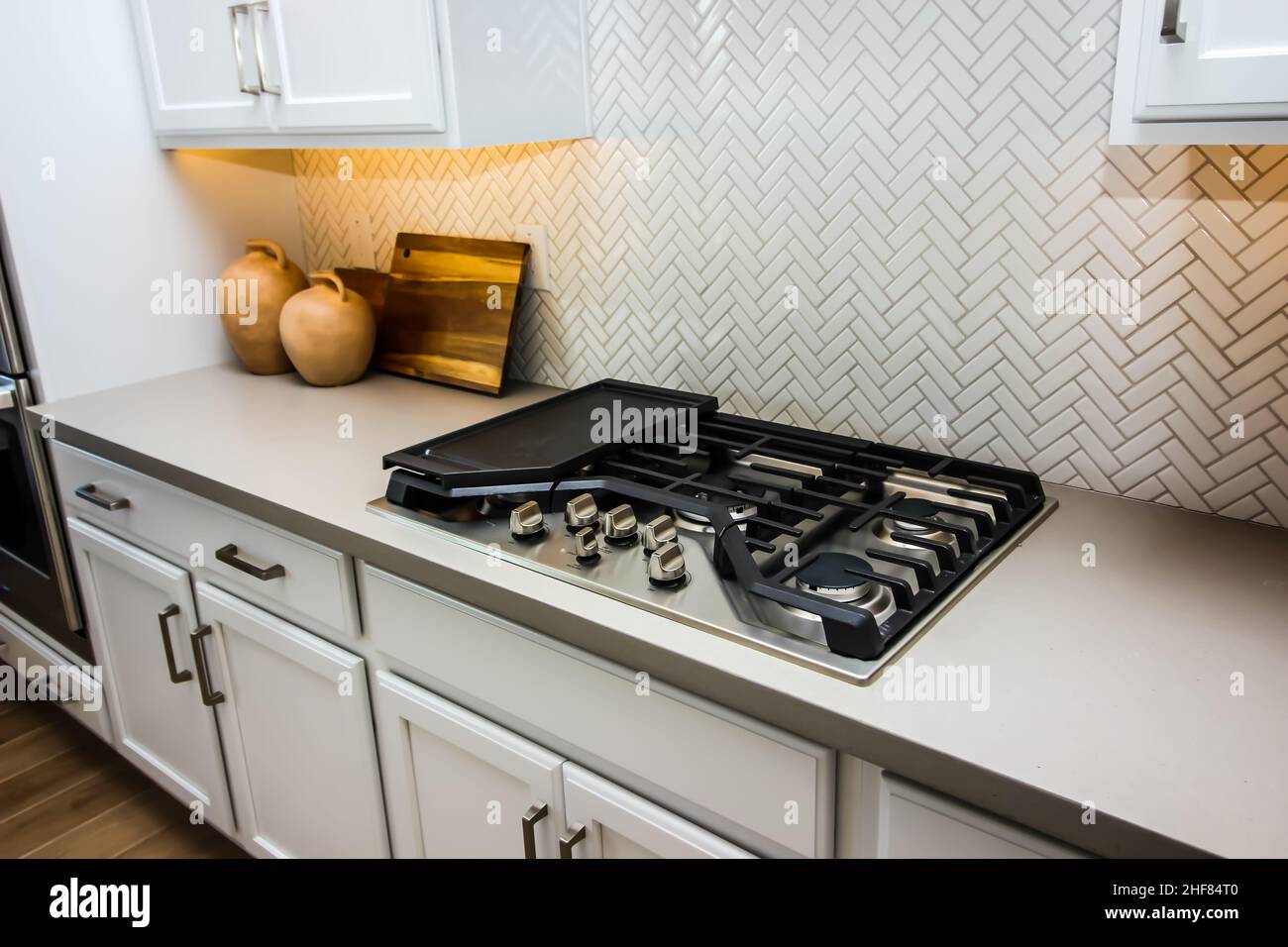 Kitchen Counter Wigh Gas Cook Top, Cutting Boards And Decorative Jugs ...