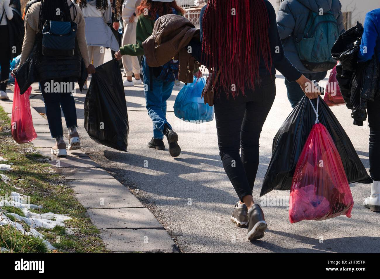 A group of young people who collect garbage within the scope of social ...