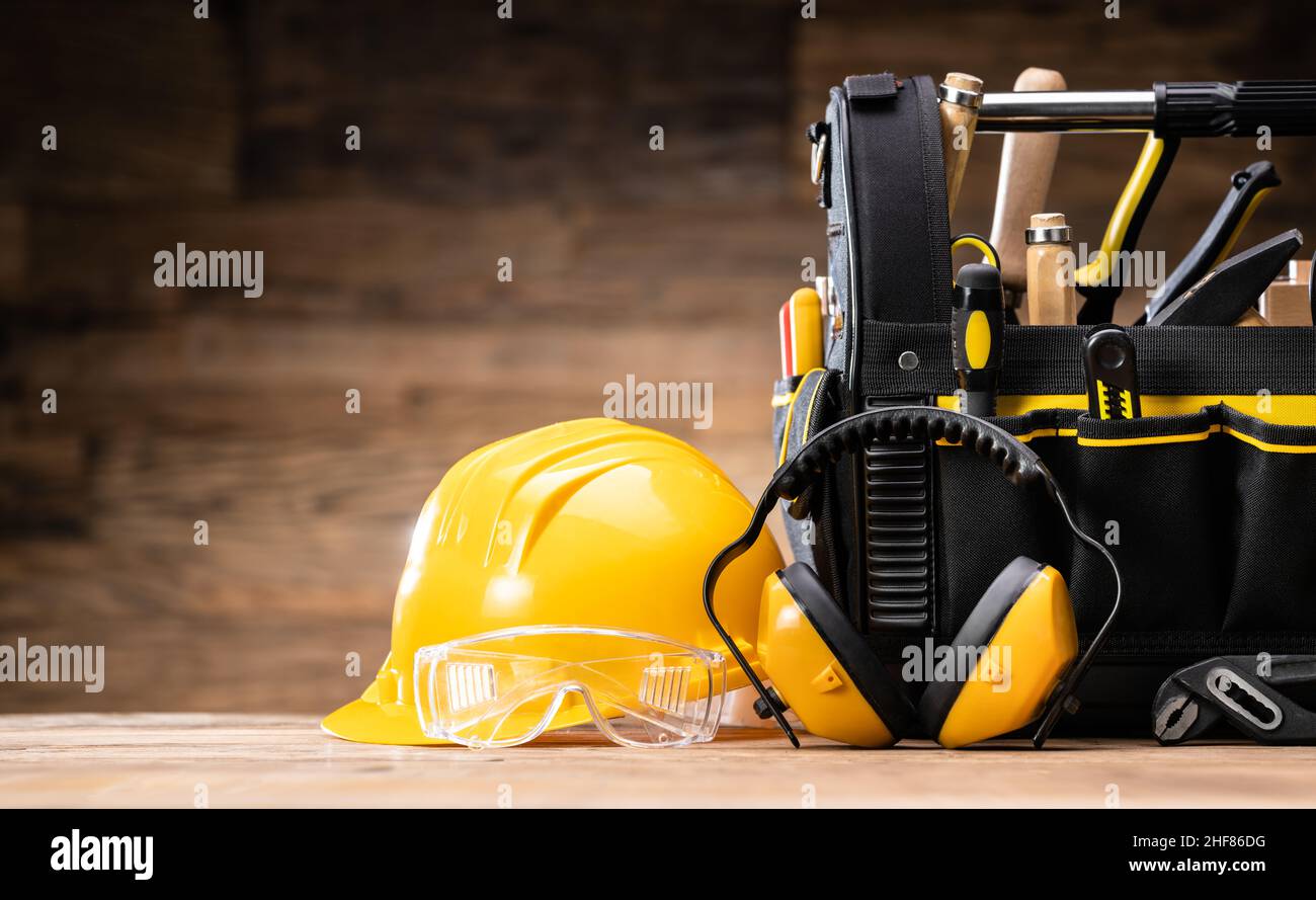 Various Manual Tools And Hardware In Toolbox On Wooded Background Stock ...