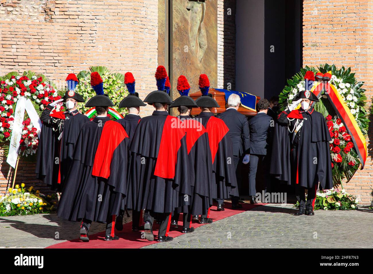 Rome, Italy. 14th Jan, 2022. The coffin arrives in the church draped in ...