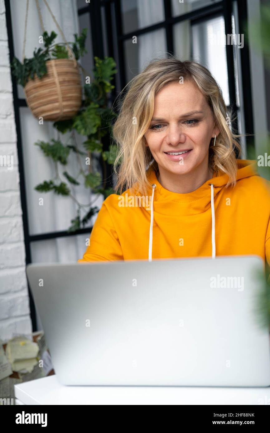 Happy woman girl Using computer laptop working office work remotely ...
