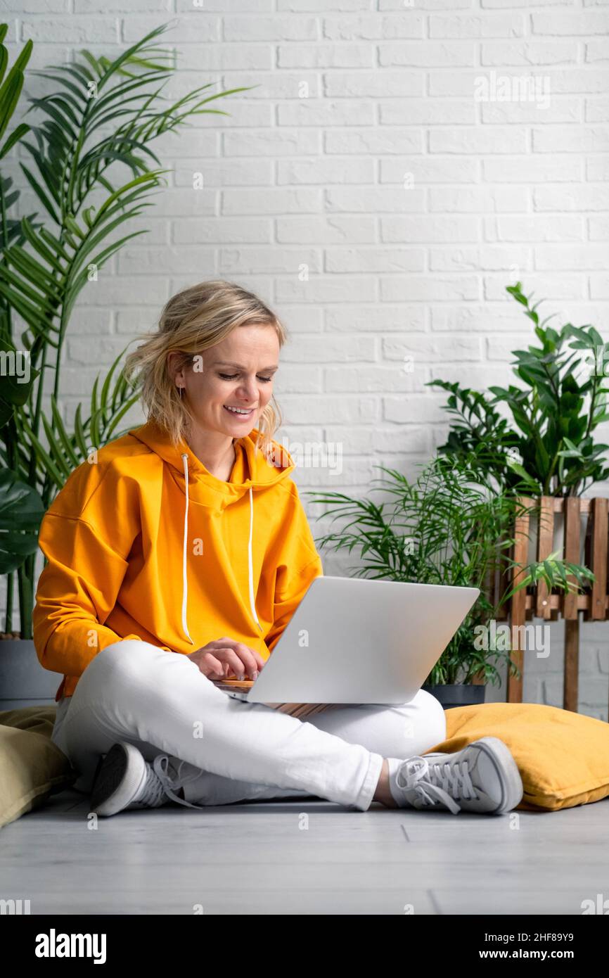 Woman girl using computer laptop working office work remotely from home ...