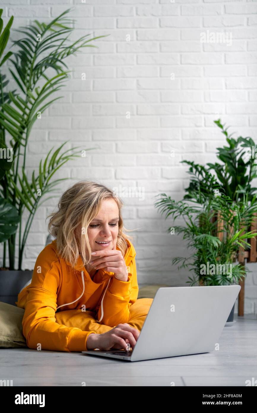 Woman girl using computer laptop working office work remotely from home ...