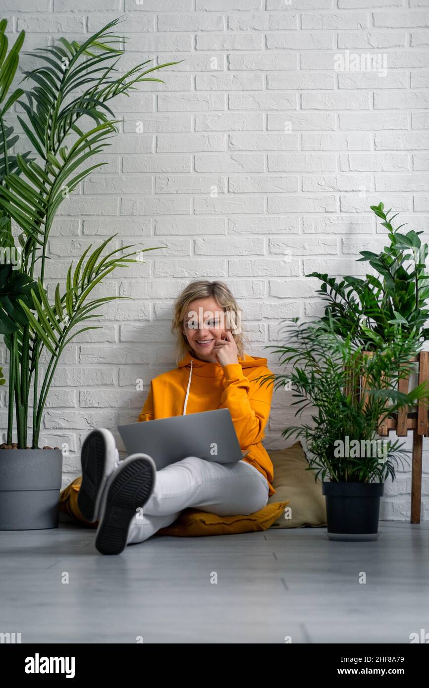 Woman girl using computer laptop working office work remotely from home ...