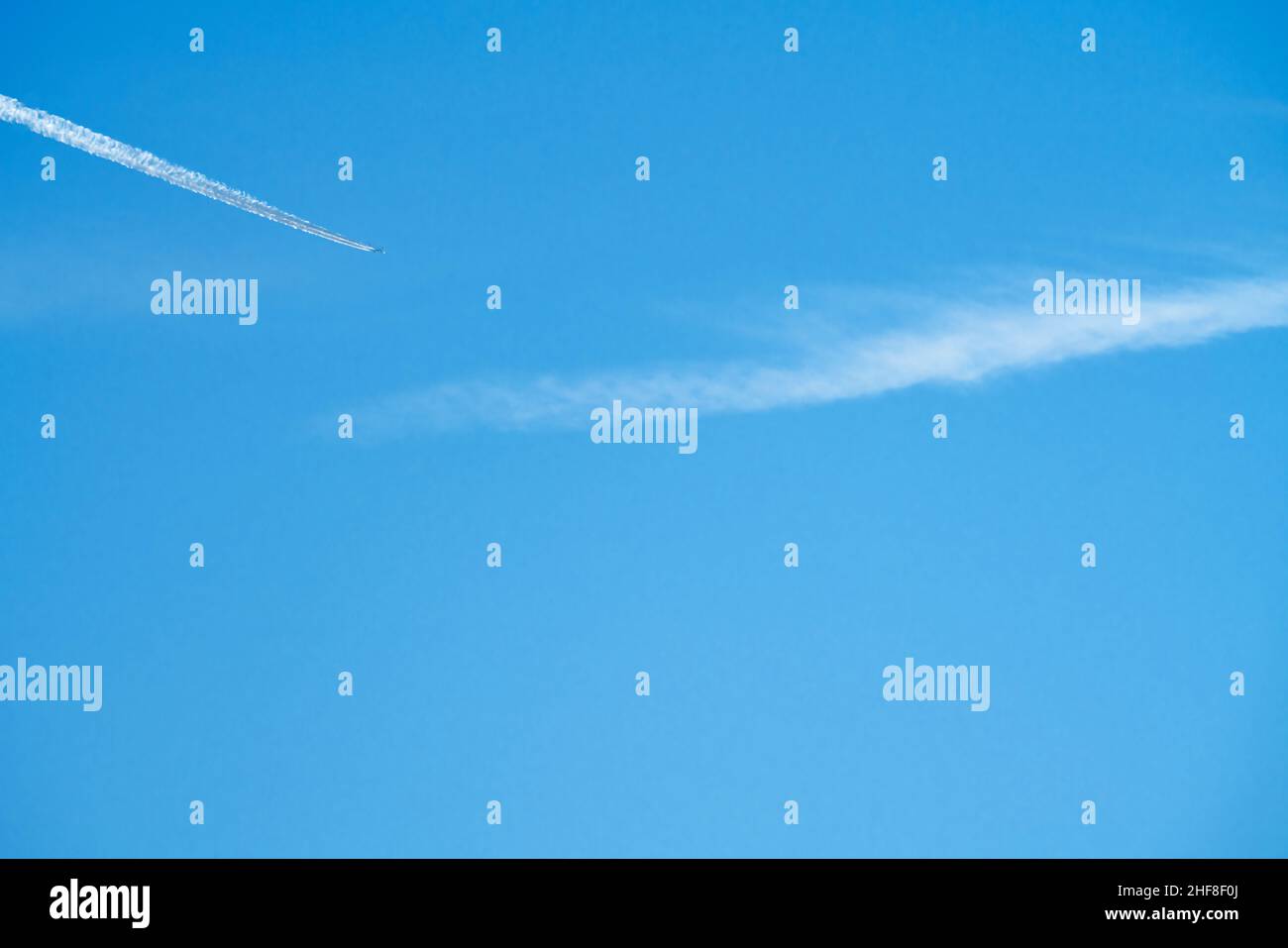 high altitude contrails from a KLM Boeing 787-10 dreamliner heading ...