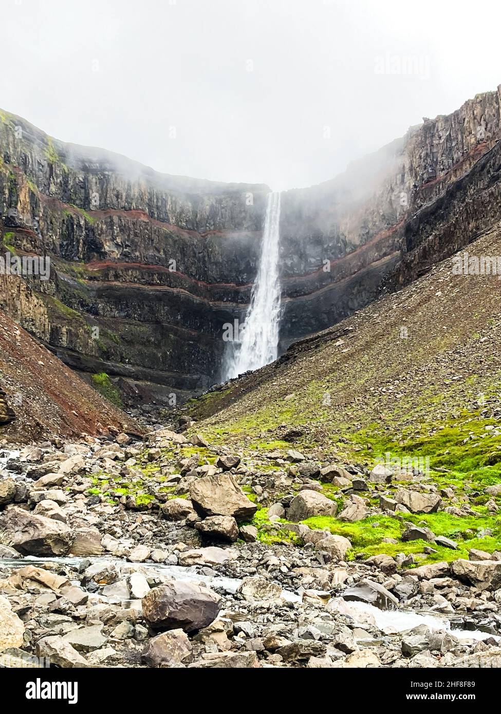 The Waterfall and basaltic rocks at the Litlanesfoss Valley in Iceland ...