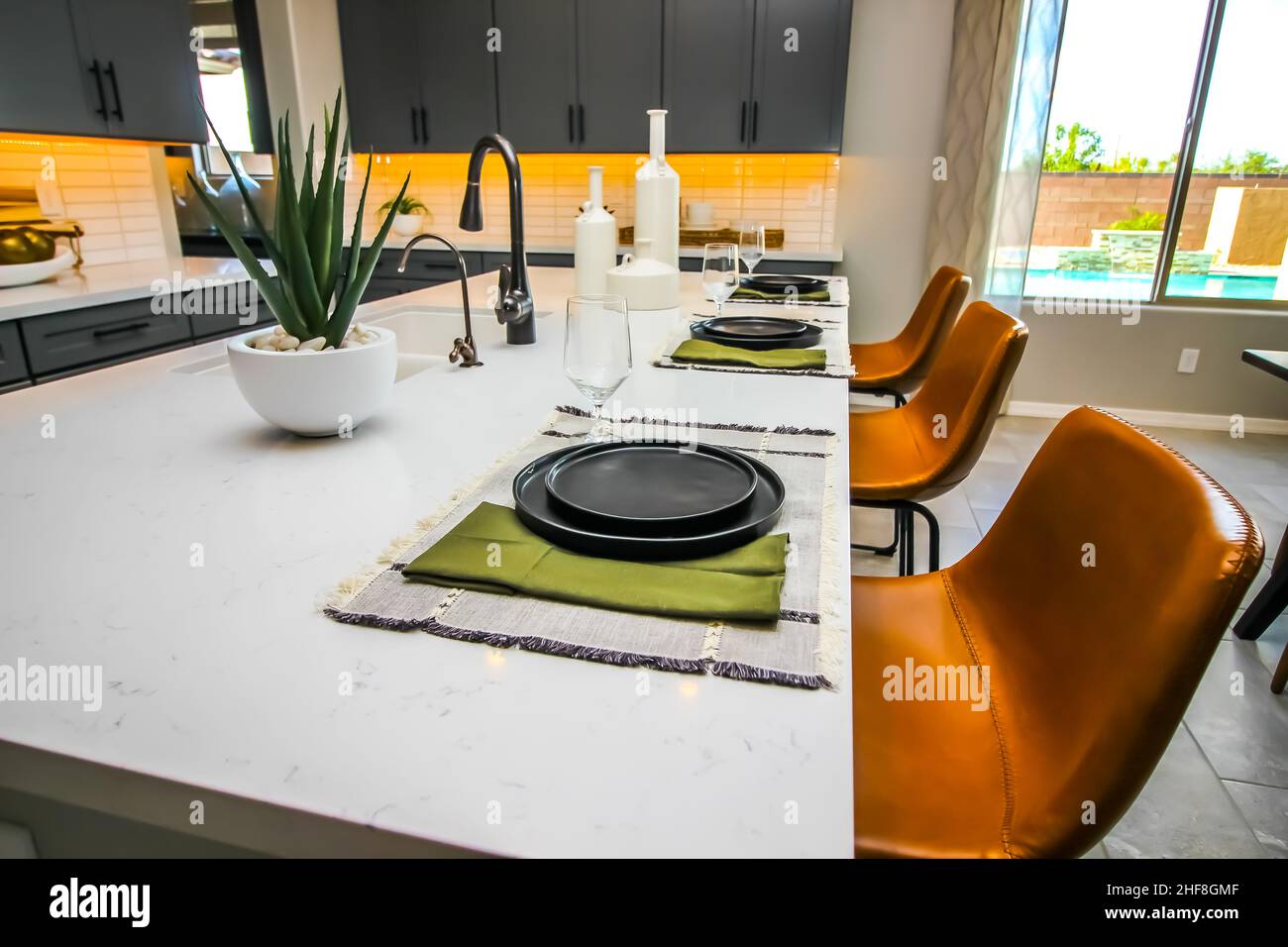 Kitchen Island Counter Top With Decorator Items And Place Settings ...
