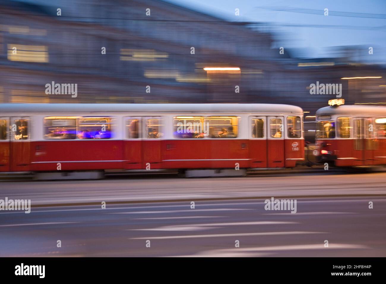 red old trolley car in Vienna in the first District by night Stock ...