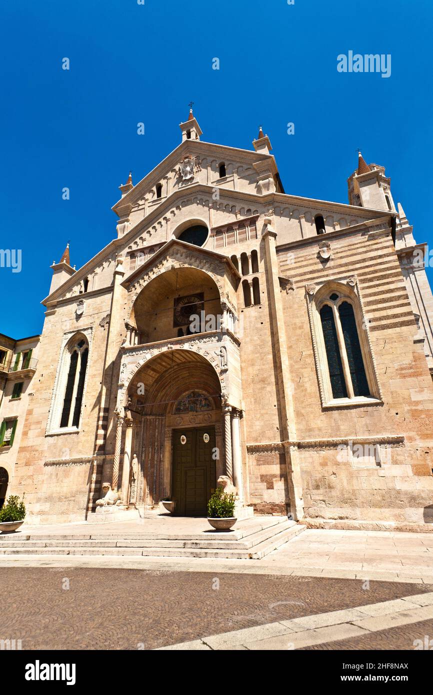The facade of the catholic middle ages romanic cathedral in Verona, the ...