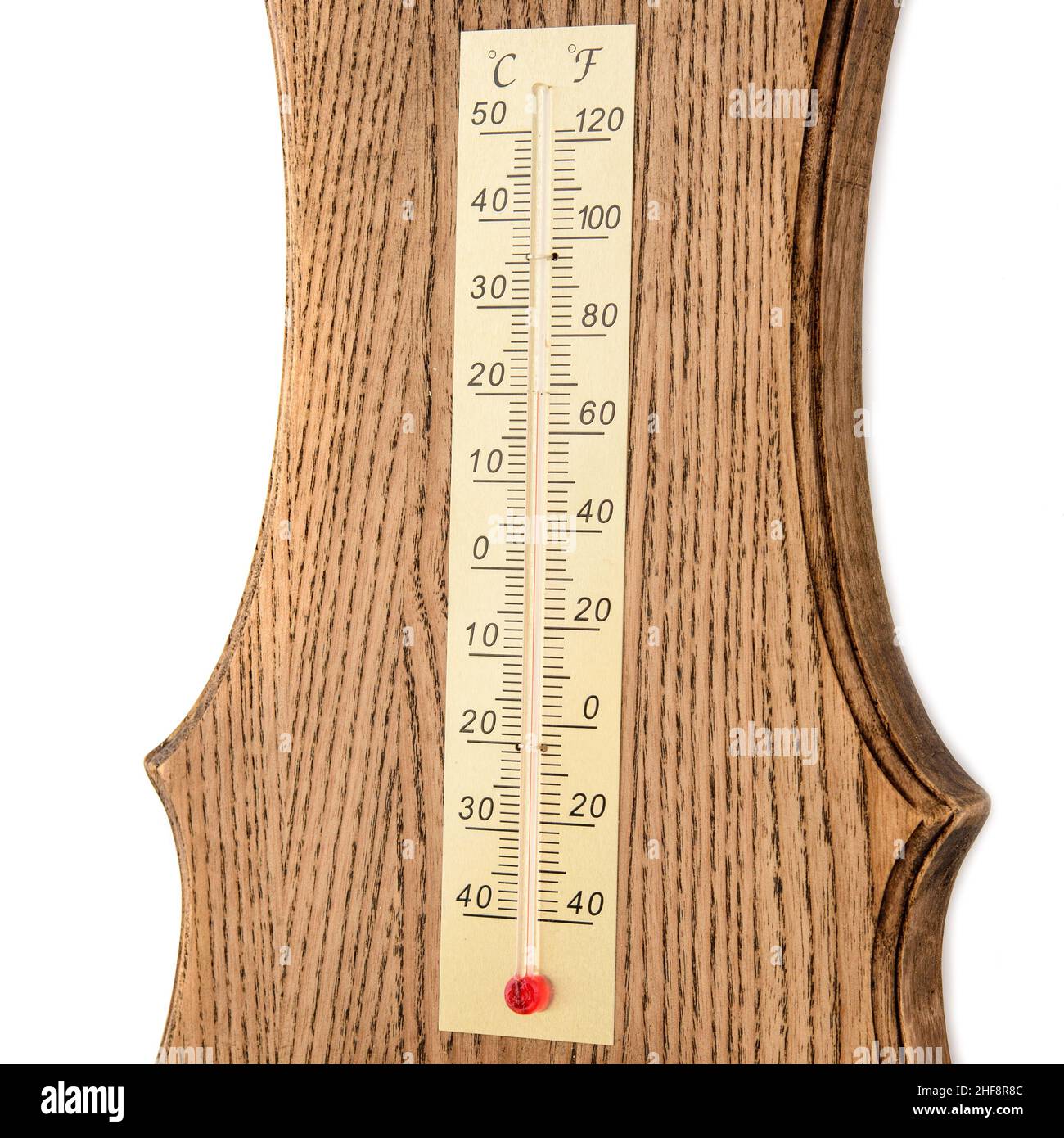 Old style thermometer on wood texture isolated on white background ...