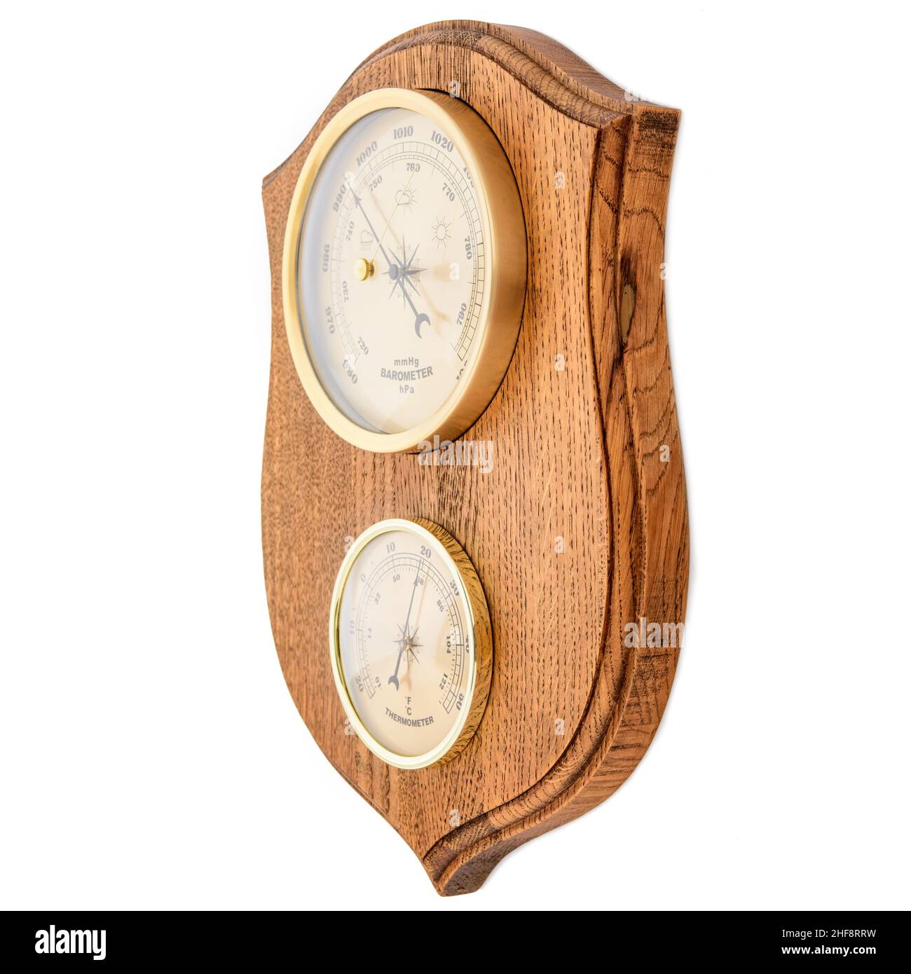 Vintage wooden clock with barometer and Old marine style thermometer on ...