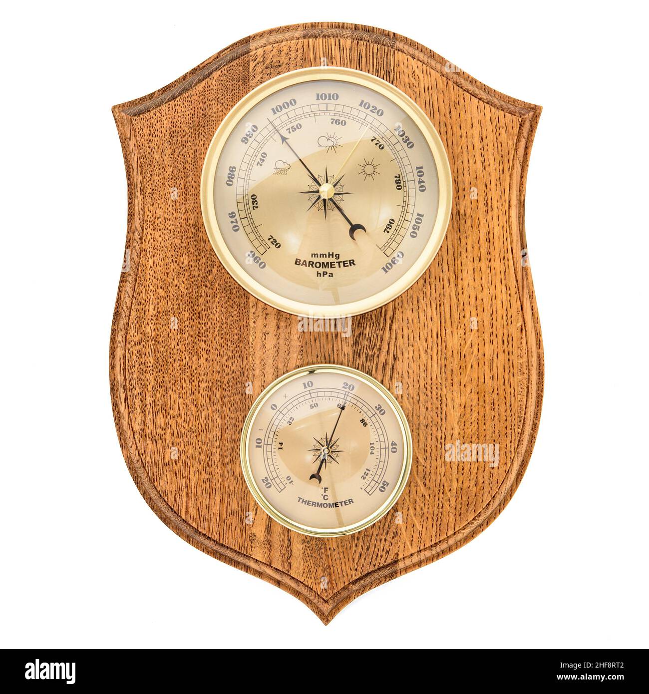 Vintage wooden clock with barometer and Old marine style thermometer on ...