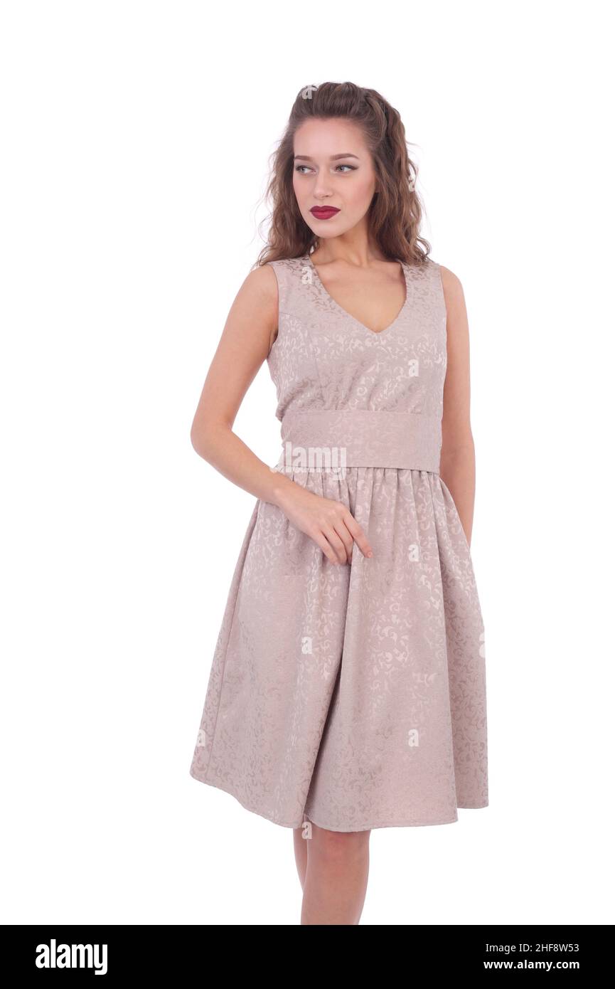 pretty young girl wearing beige evening dress Stock Photo - Alamy