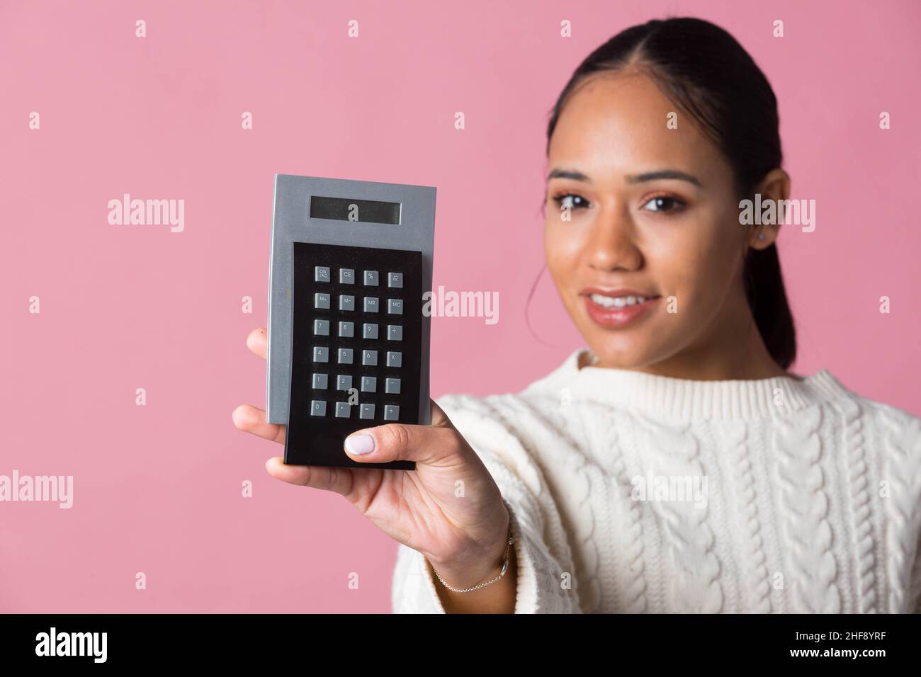 Girl with calculator hi-res stock photography and images - Alamy