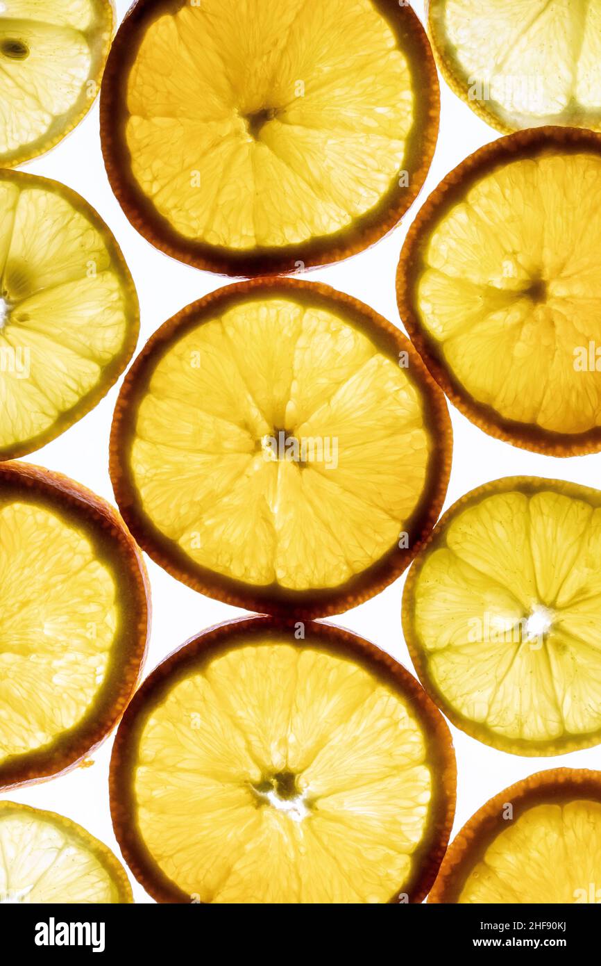 Orange and lemon slices background Stock Photo - Alamy