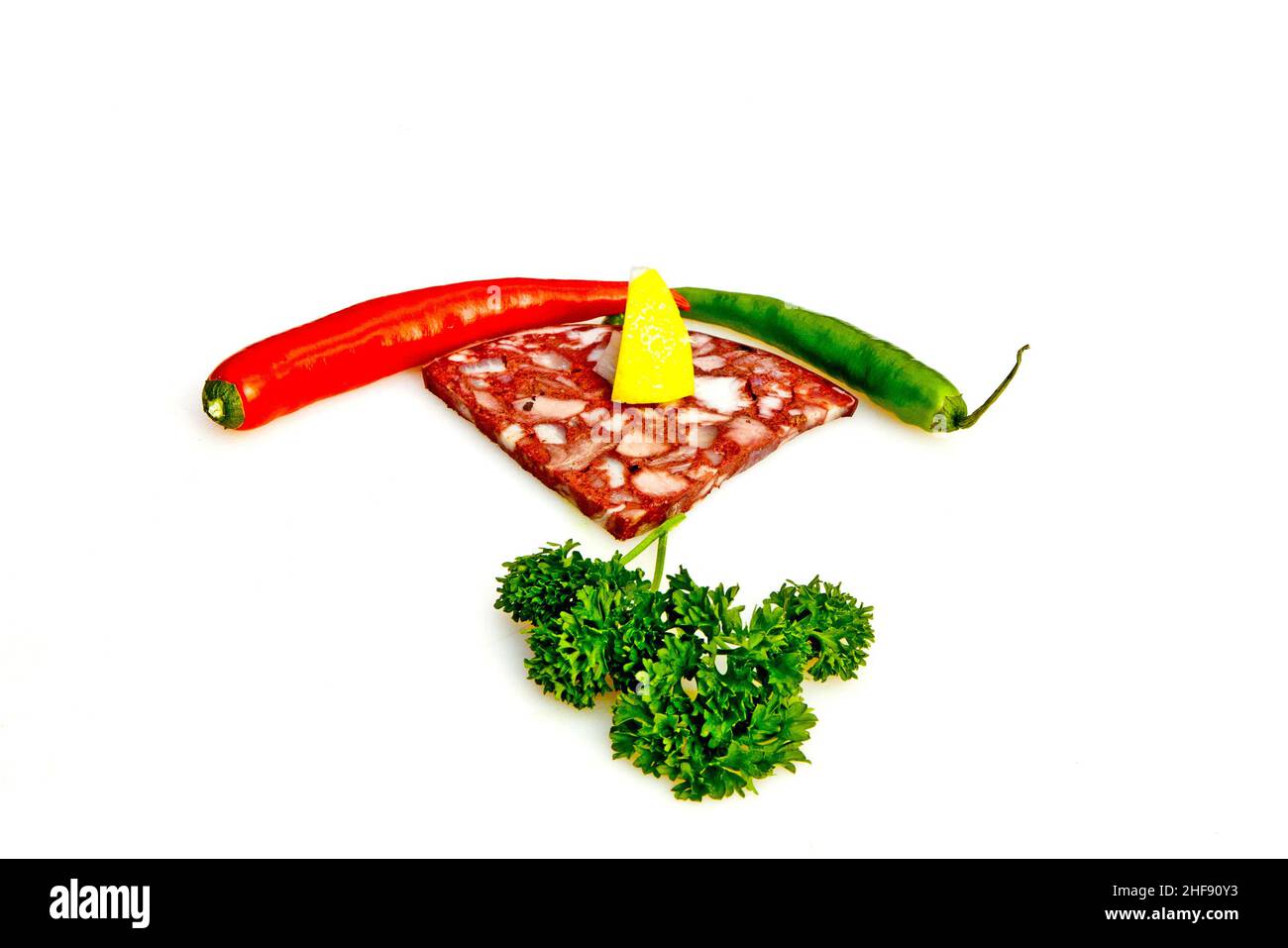 smiling face formed by meat and vegetables Stock Photo - Alamy