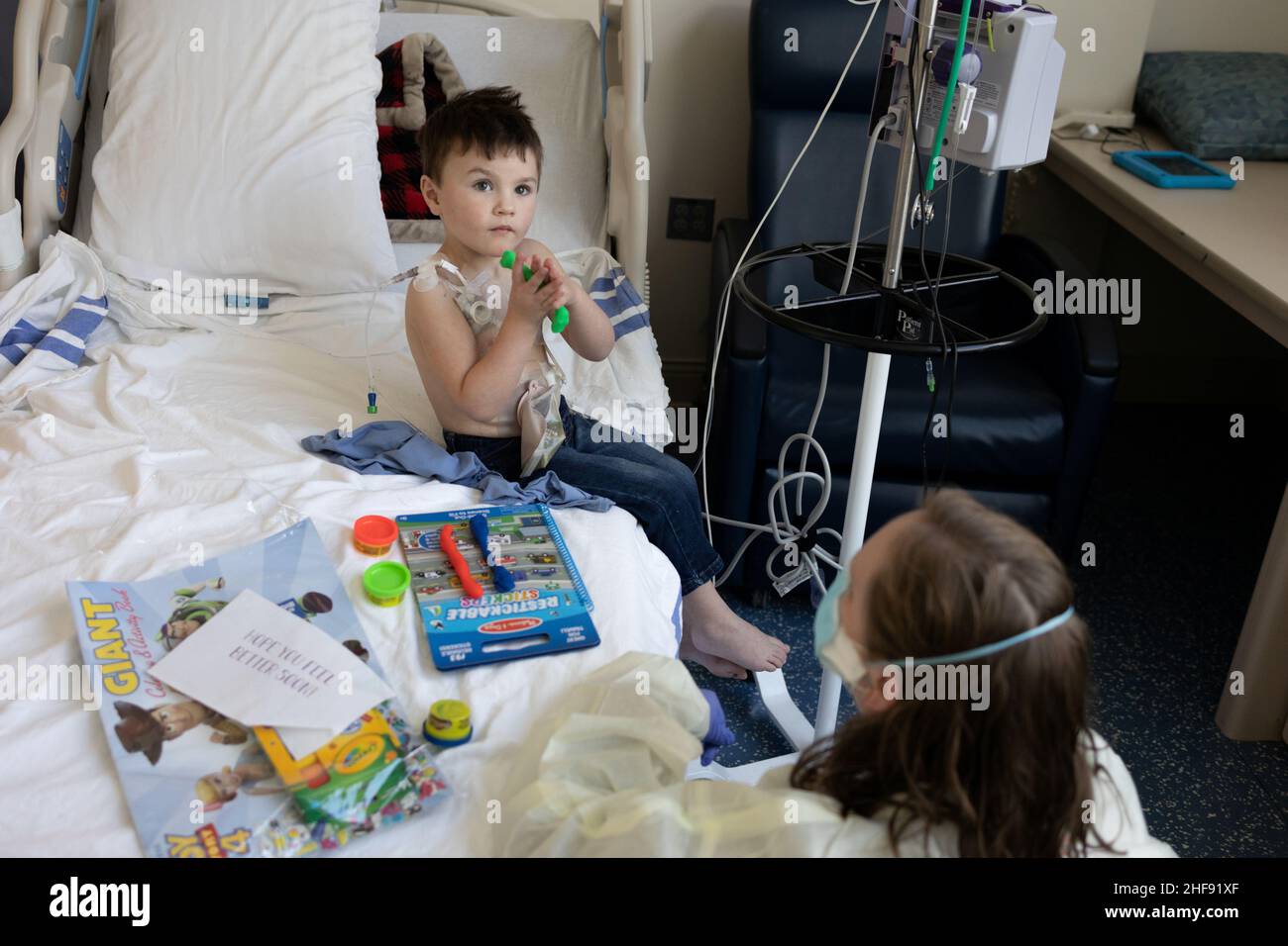 Brayden Burton, 3, plays with child life specialist Maggie Kail, CCLS ...