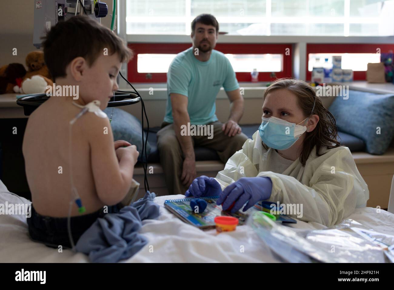 Brayden Burton, 3, plays with child life specialist Maggie Kail, CCLS ...