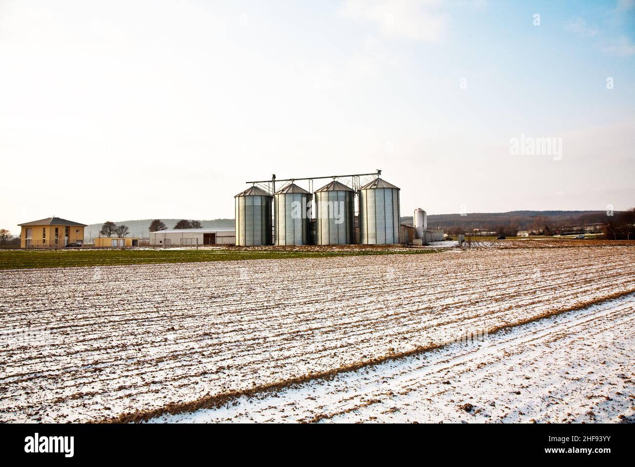 acres with snow in winter with silo in beautiful light and structure ...