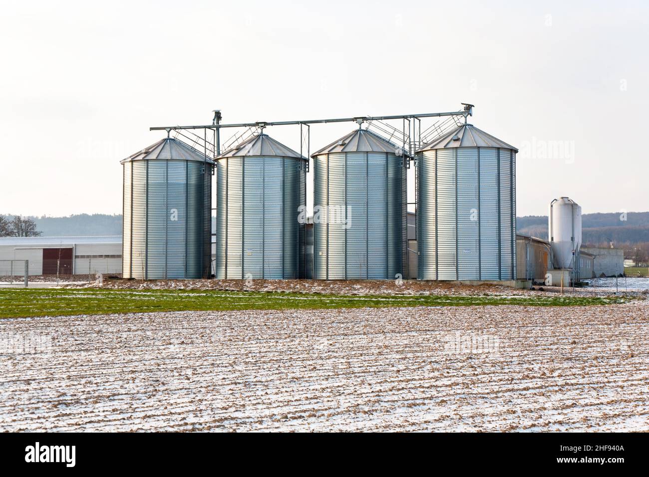 acres with snow in winter with silo in beautiful light and structure ...