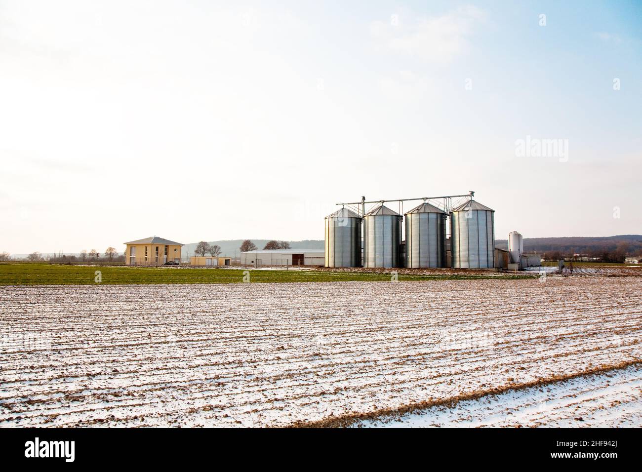 acres with snow in winter with silo in beautiful light and structure ...