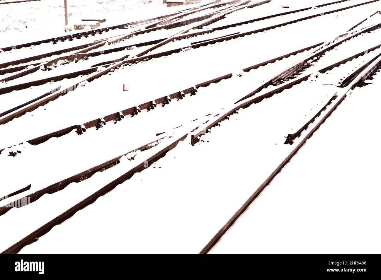 Railroad tracks in Winter with snow Stock Photo - Alamy