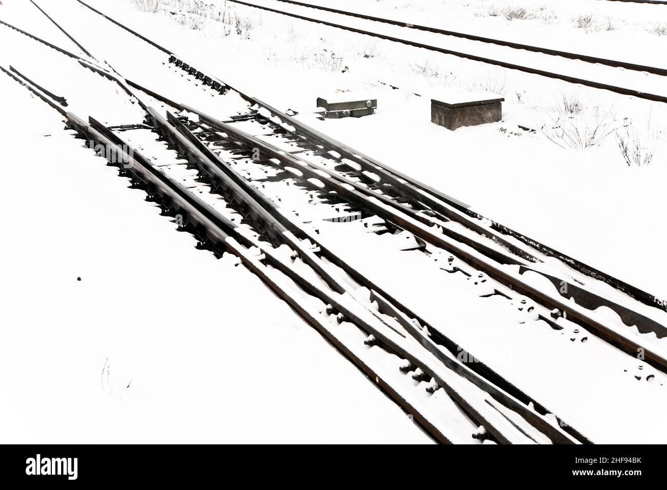 Railroad tracks in Winter with snow Stock Photo - Alamy