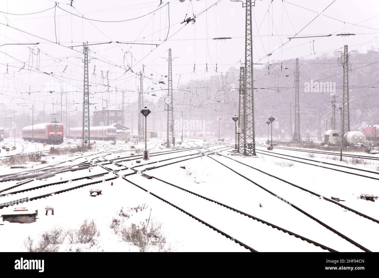 Railroad tracks in Winter with snow Stock Photo - Alamy