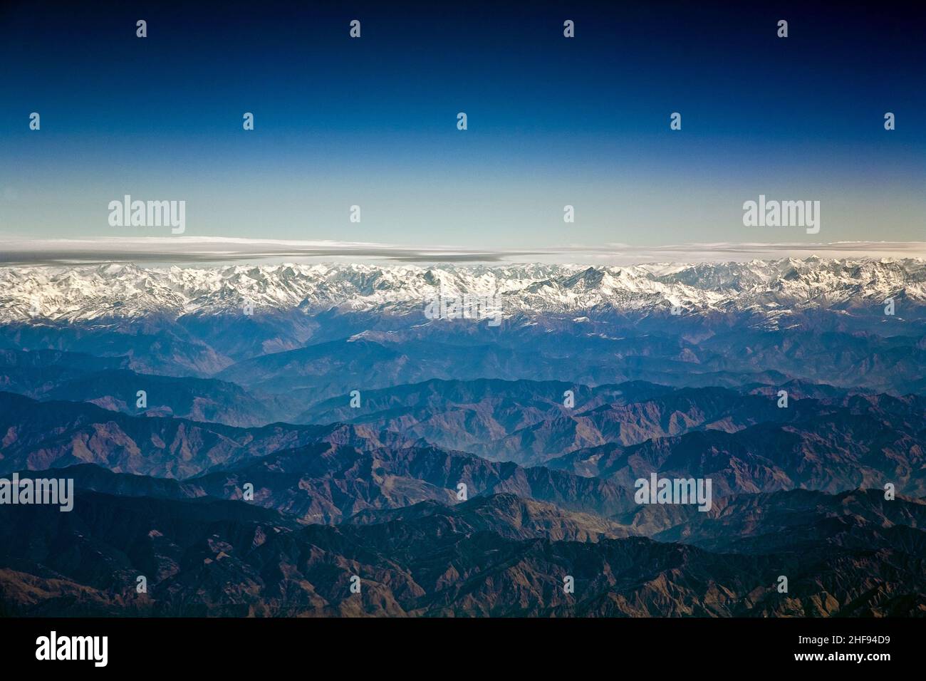 flying over the Himalaya in the morning with sunrise Stock Photo - Alamy