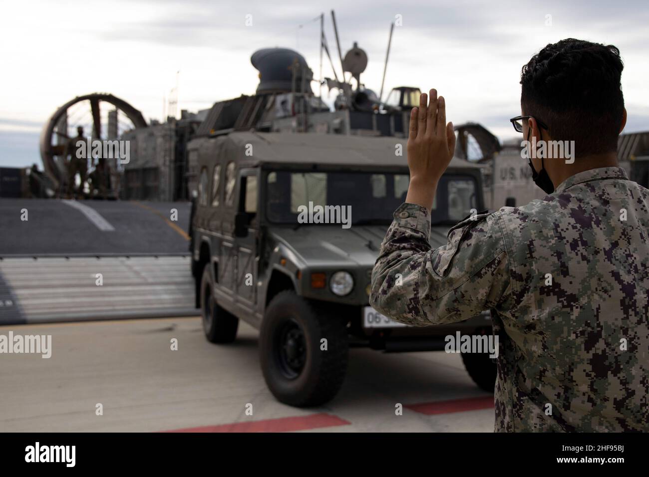 U.S. Navy Boatswain’s Mate Seaman Christopher Castro, assigned to ...