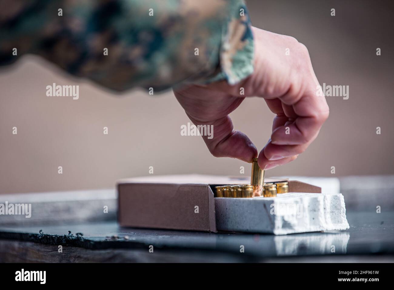 Marines with 23rd Marine Regiment, 4th Marine Division, conduct pistol ...