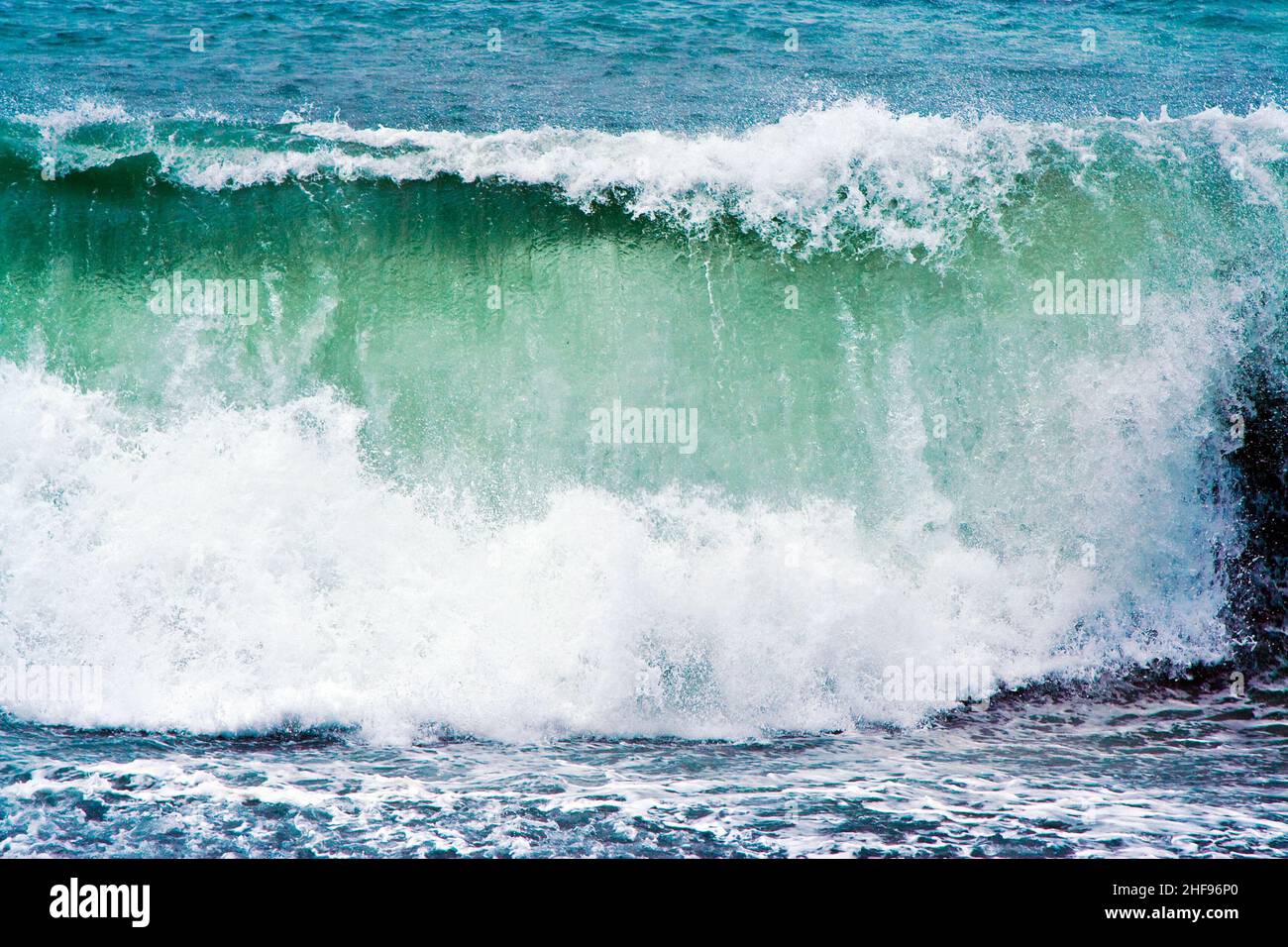 heavy waves with white wave crest in storm at the beach from Janubio, a ...