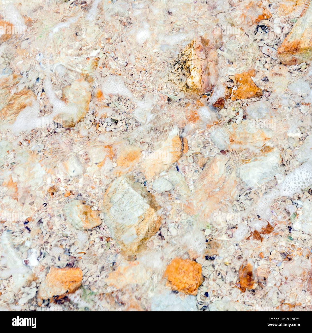 beautiful structured stones at the beach in harmonic way gives an ...