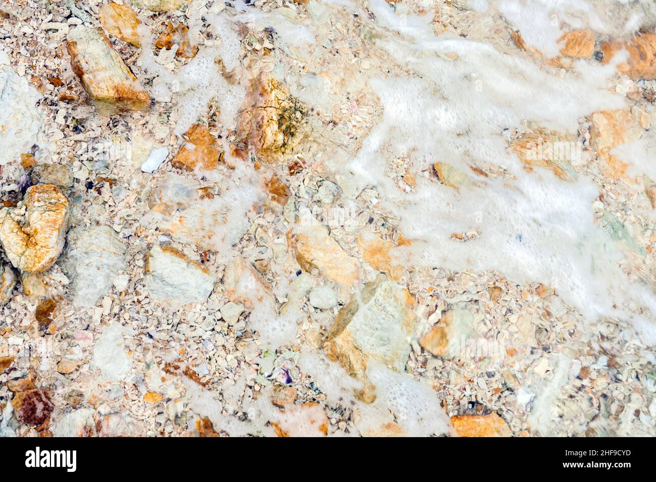 beautiful structured stones at the beach in harmonic way gives an ...