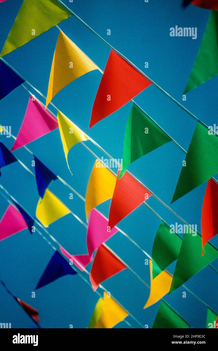 Colorful advertising pennants attract customers to a California ...