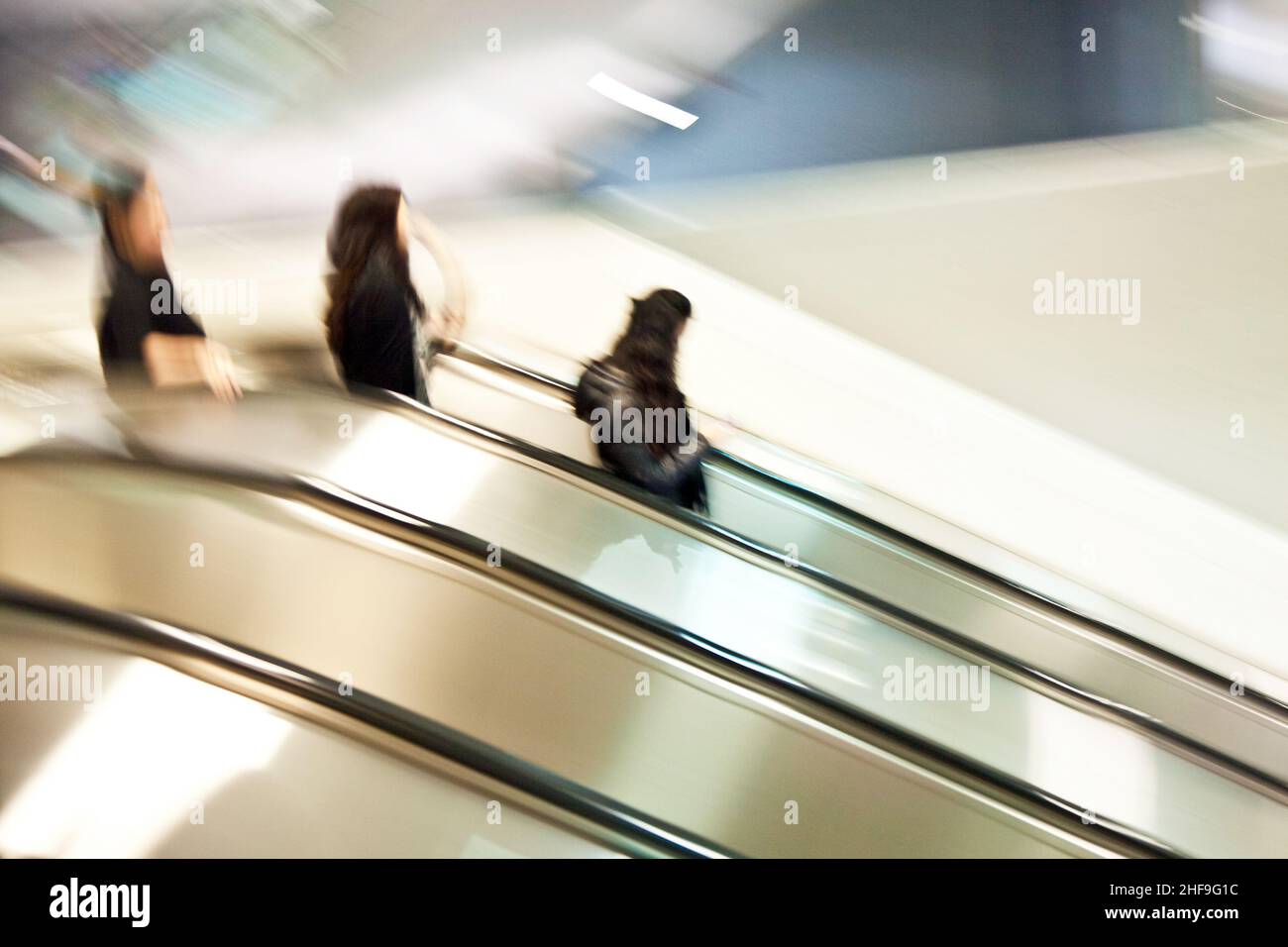 people on a moving staircase Stock Photo - Alamy