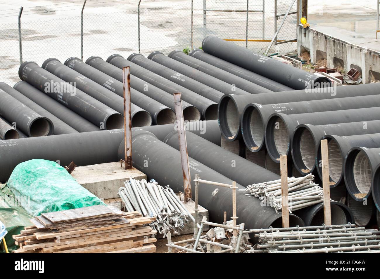 huge water pipes are stored at the building site Stock Photo - Alamy